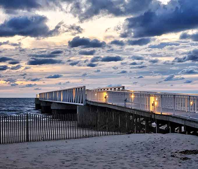 Where the boardwalk meets the sea, and dramatic skies remind us why coastal sunsets never get old.