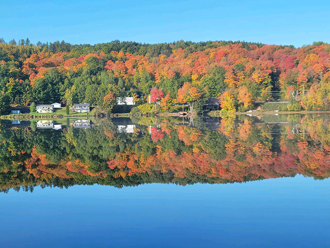 Nature puts on its most spectacular show each autumn, when the forests surrounding Hancock burst into a kaleidoscope of colors perfectly mirrored in the still waters.