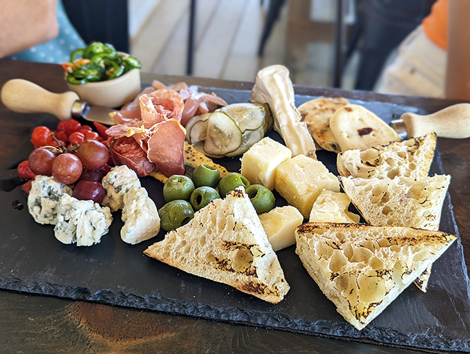 A charcuterie board that tells Maine's culinary story – local cheeses, cured meats, and accompaniments arranged with artistic flair.
