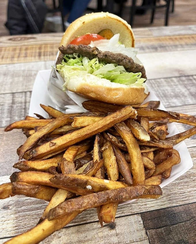 Classic Cheese Burger: This isn't just any cheeseburger—hand-cut fries and a perfectly seasoned patty elevate the humble classic to art form status.