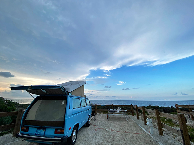Paradise found &ndash; this sky-blue VW beauty claims the ultimate oceanfront real estate, where morning coffee comes with million-dollar views.