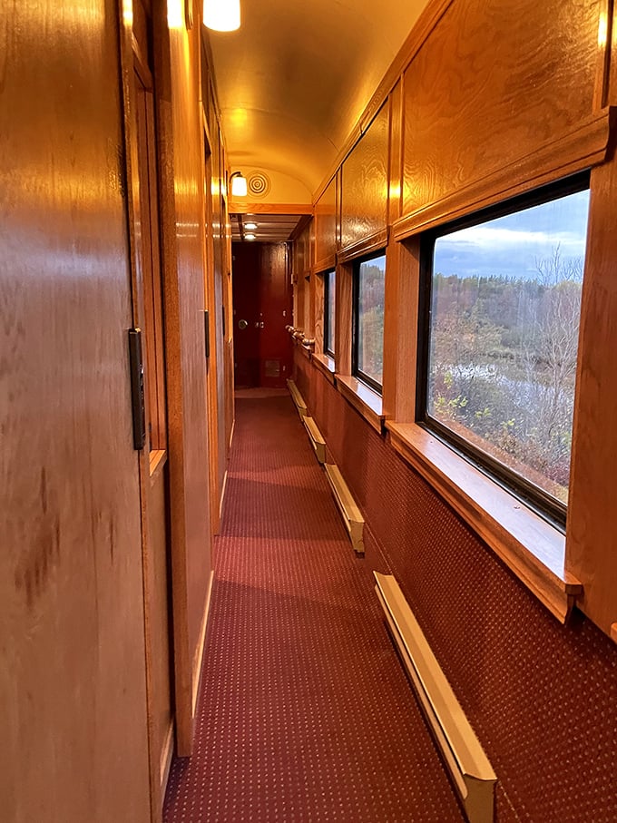 Polished wood corridors invite exploration between cars &ndash; each step a journey through railroad's golden age.