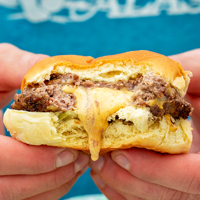 Behold the original Juicy Lucy in all its glory &ndash; that moment when molten cheese meets beef in a marriage that defies conventional burger physics.
