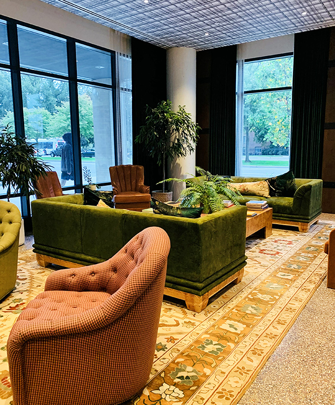 Sink into these plush green sofas and you might forget you're in a hotel lobby rather than an upscale woodland retreat.