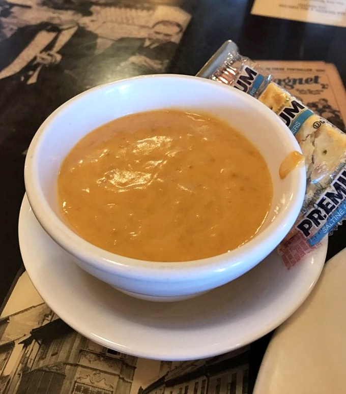 The Lobster Bisque arrives like a warm hug in a bowl – creamy, rich, and soul-satisfying. Perfect for Michigan's chilly lakeside evenings.