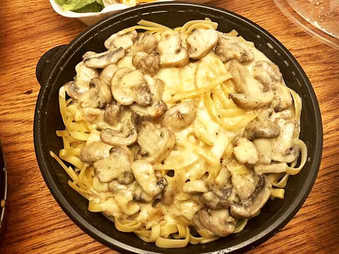 Mushroom Pasta: Earthy mushrooms swimming in a creamy sauce that clings lovingly to each strand of pasta &ndash; comfort food that whispers, "Everything's going to be alright."