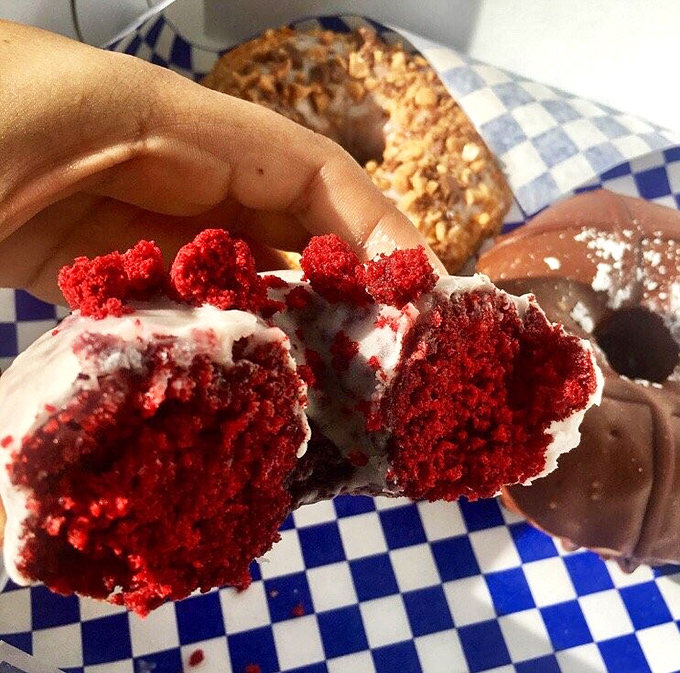 Red velvet doughnut perfection topped with cream cheese frosting proves that some flavor combinations are simply meant to be together forever.