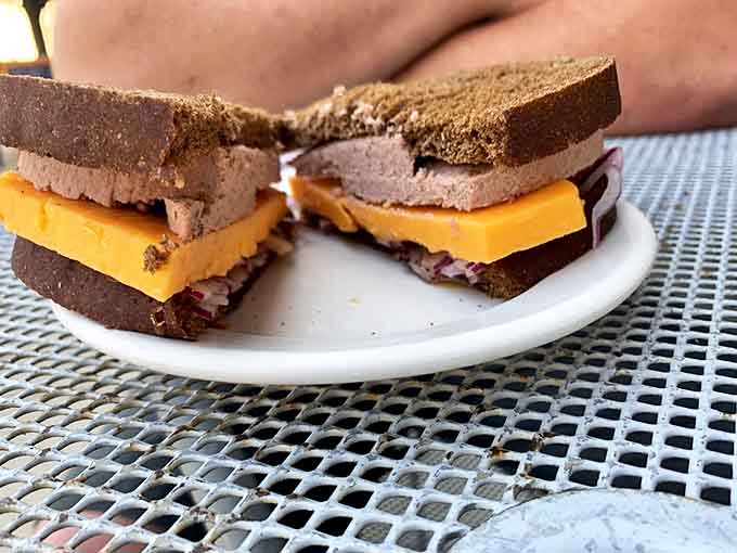 The infamous Limburger sandwich in all its pungent glory &ndash; a thick slab of aromatic cheese that's not for the faint of heart or sensitive of nose.