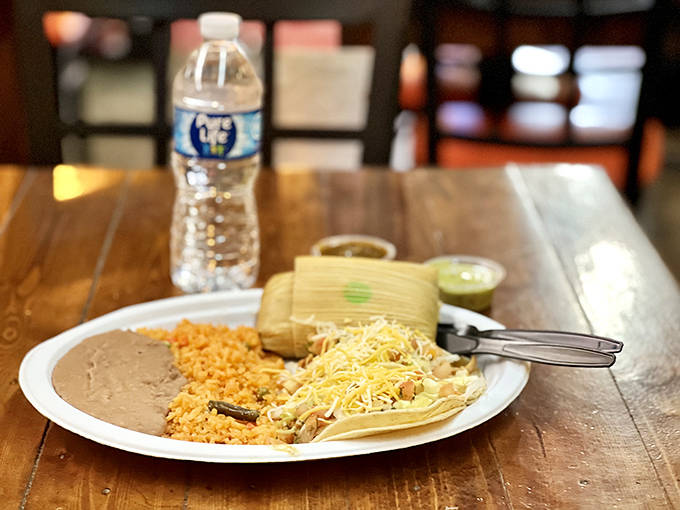 This isn't just any tamale, it's a handcrafted bundle of joy, steamed to perfection and waiting to reveal its savory treasures.