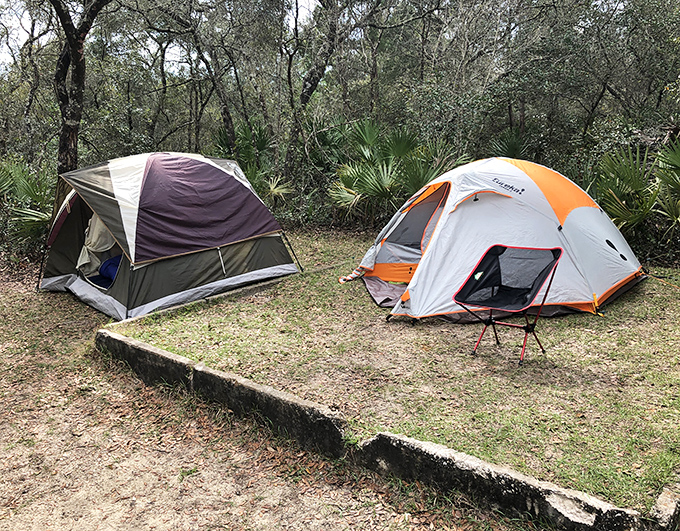 Camping nirvana: where your morning commute is a 30-second walk from tent flap to spring water. No alarm clock needed.
