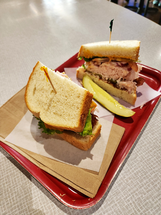 Turkey sandwich perfection: Not just layers of meat, but an architectural marvel requiring both strategy and jaw flexibility to conquer its delicious heights.