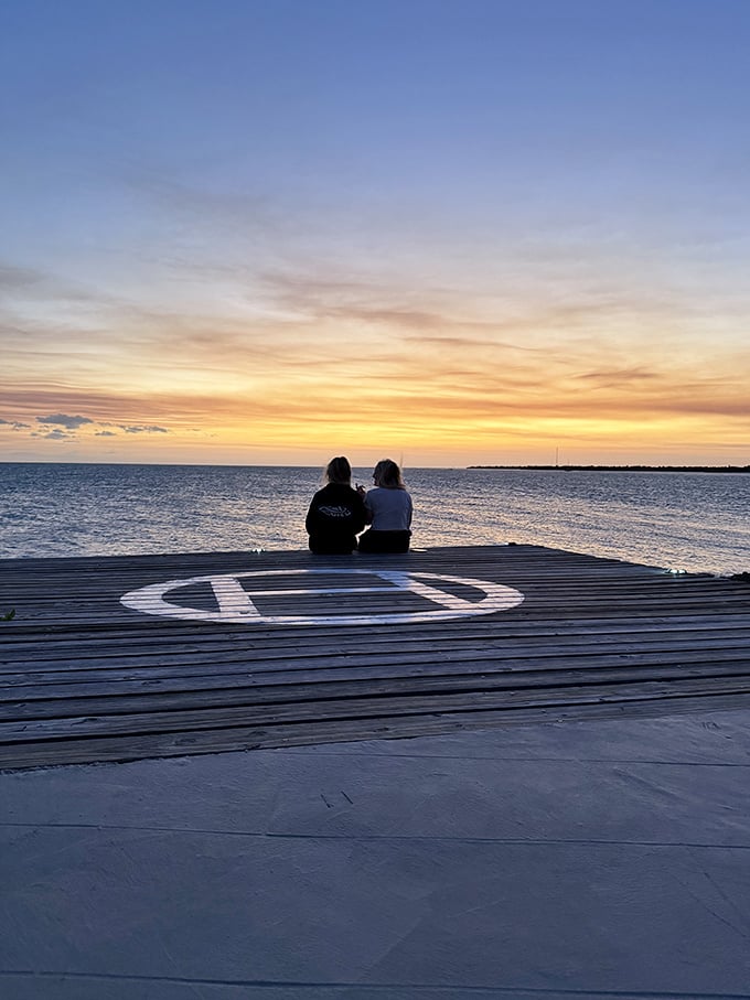 Sunset transforms the dock into front-row seats at nature's daily masterpiece. No tickets required, just perfect timing.