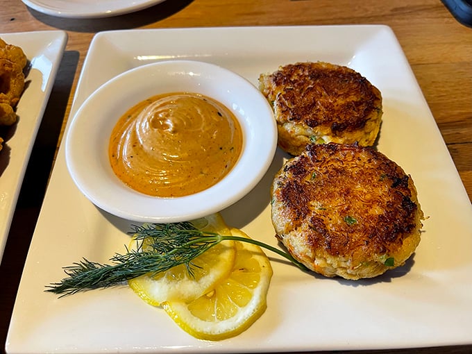These aren't your average crab cakes &ndash; they're glorious mounds of sweet crab meat, lightly bound and perfectly seasoned with a tangy accompaniment.