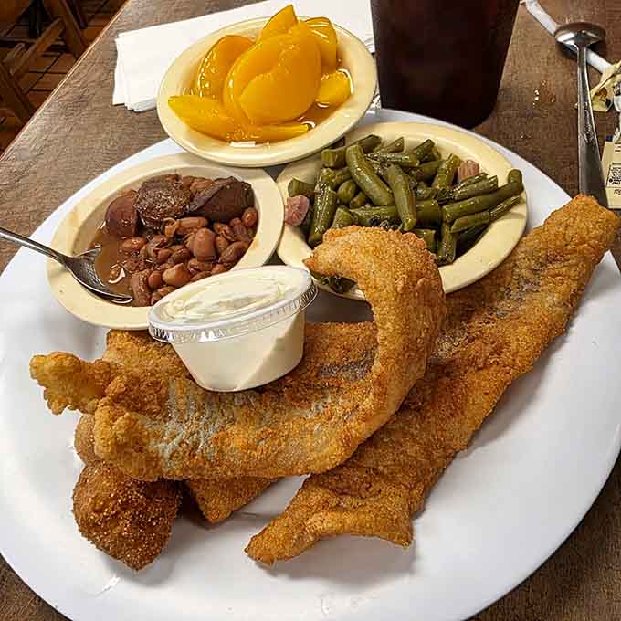 That golden fried catfish with green beans and peaches is what happens when Southern cooking traditions meet serious kitchen skills and generous portions.