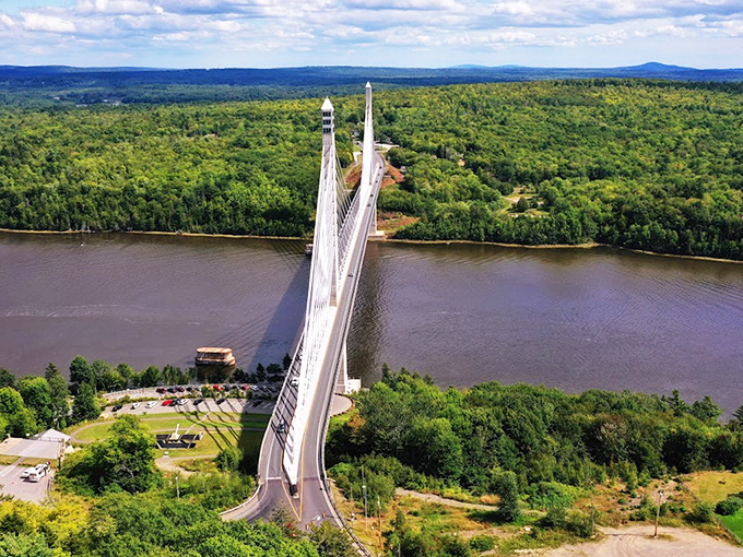 Autumn transforms the view from the observatory into a tapestry of reds and golds, with the river cutting a blue path through fall's fiery display.