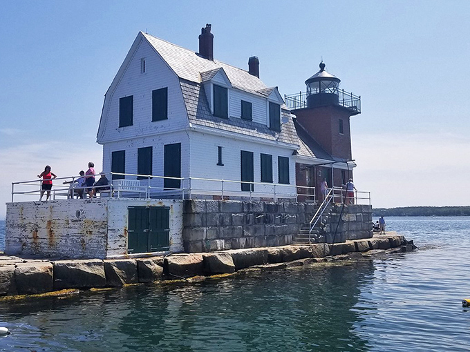 Winter brings a different kind of beauty to the breakwater, when fewer visitors brave the elements for a more solitary lighthouse experience.