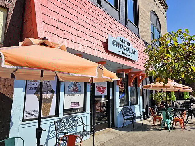 Alpine Chocolat Haus welcomes visitors with its classic brick storefront &ndash; a chocolate landmark that promises sweet memories in the making.