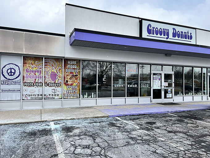 Groovy Donuts brings retro vibes and psychedelic fun to East Lansing with its distinctive peace sign logo and colorful storefront.