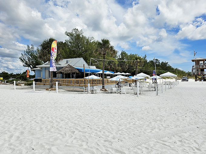 Dine where the land meets the sea. The Sandbar's historic building stands proudly on the white sands, welcoming hungry beach-goers for decades.