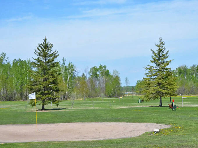 Sand greens and wildlife spectators make the Angle Inlet Golf Course a uniquely northern golfing experience.