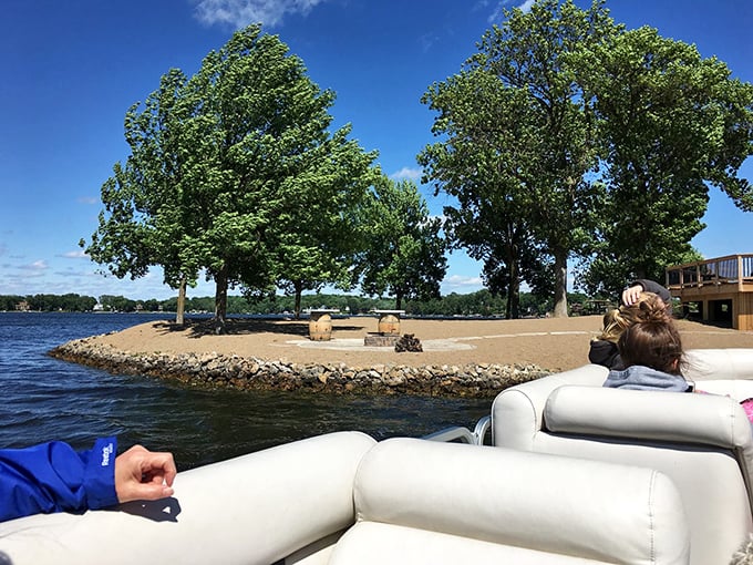 Approaching by boat reveals the island's perfect proportions, a self-contained world waiting to be explored.