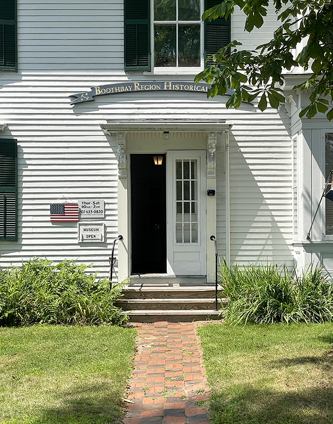 History breathes through the white clapboard walls of the Boothbay Region Historical Society, keeper of the town's seafaring stories.
