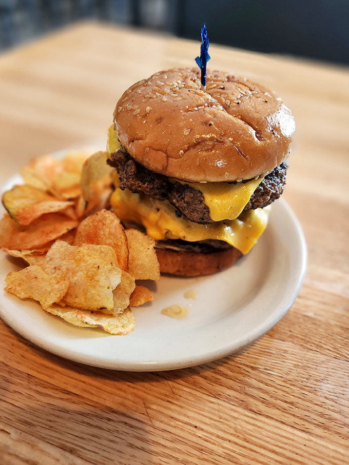This isn't just any burger &ndash; it's DiMaggio's double cheeseburger, where beef patties and melted American cheese create a beautiful mess worth every napkin.