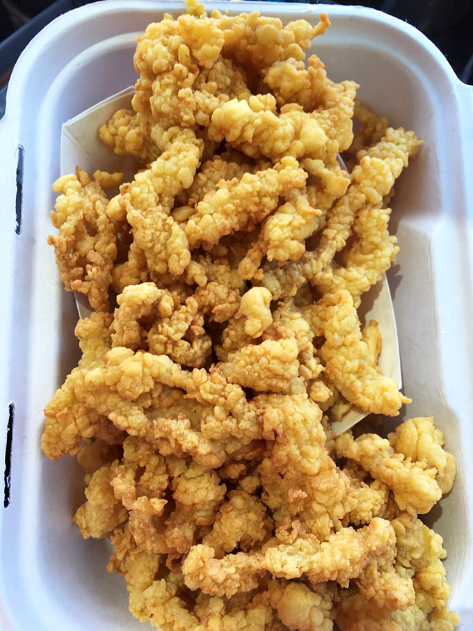Golden-brown treasures from the deep, these crispy morsels deliver the ocean's sweetness in each crunchy bite.