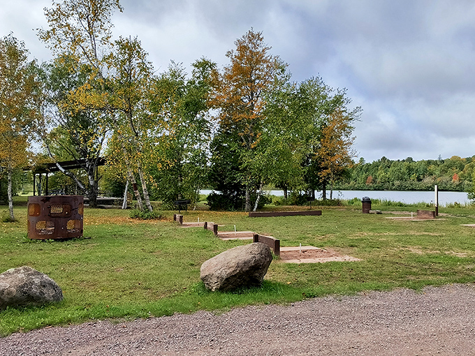 Tranquil waters reflect autumn's palette at this lakeside retreat, where locals have escaped the summer heat for generations.
