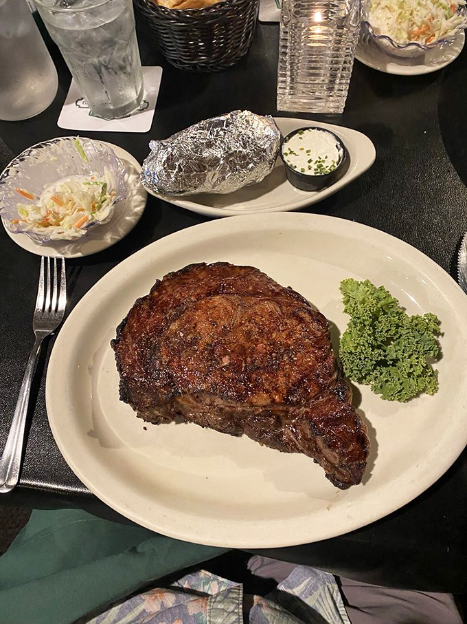 This ribeye steak isn't just dinner – it's a religious experience with a side of perfectly roasted vegetables.