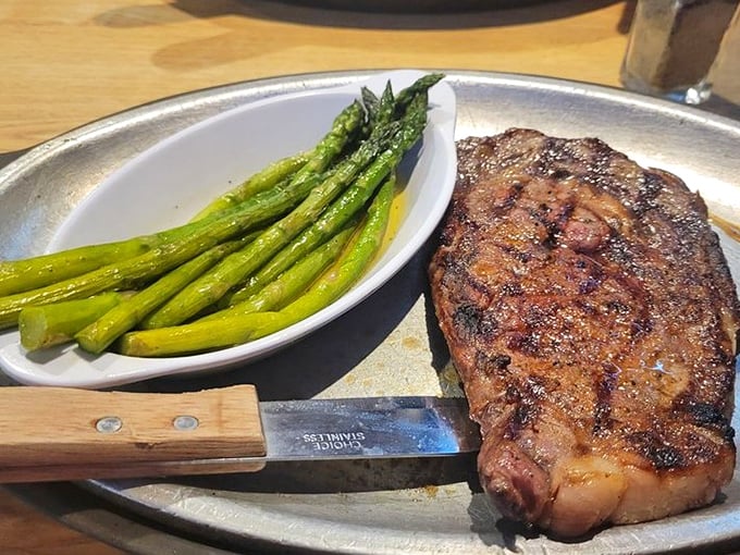 A masterpiece of marbling meets flame &ndash; this ribeye with bright asparagus proves simplicity is the ultimate sophistication.