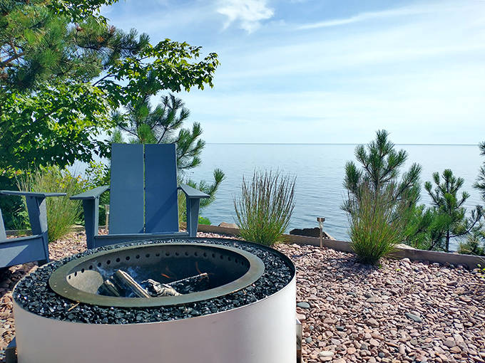 A modern fire pit overlooking Lake Superior offers the perfect spot for post-sauna contemplation and marshmallow emergencies.