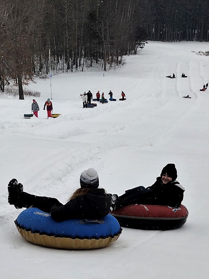 Snow tubing lanes that look like highways to happiness, where the only traffic jam involves waiting your turn for another thrilling run down.