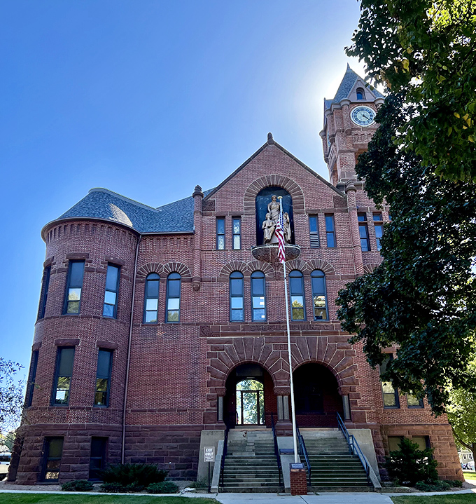 The Steele County Courthouse stands as Owatonna's architectural crown jewel, its brick facade and clock tower screaming "Norman Rockwell was here!"