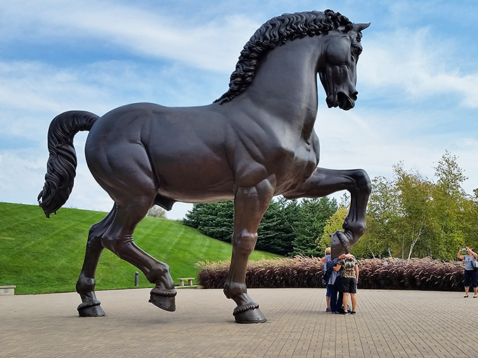 The American Horse draws admirers of all ages, its massive bronze form dwarfing humans who stand beneath it like modern-day Lilliputians.