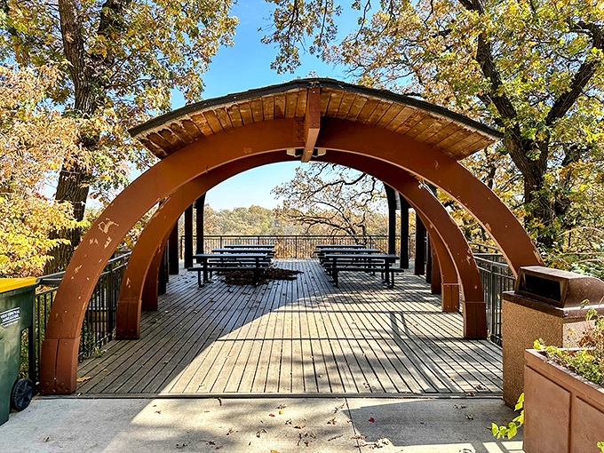 This sheltered overlook invites contemplation and sandwich consumption in equal measure, providing front-row seats to the park's natural theater.