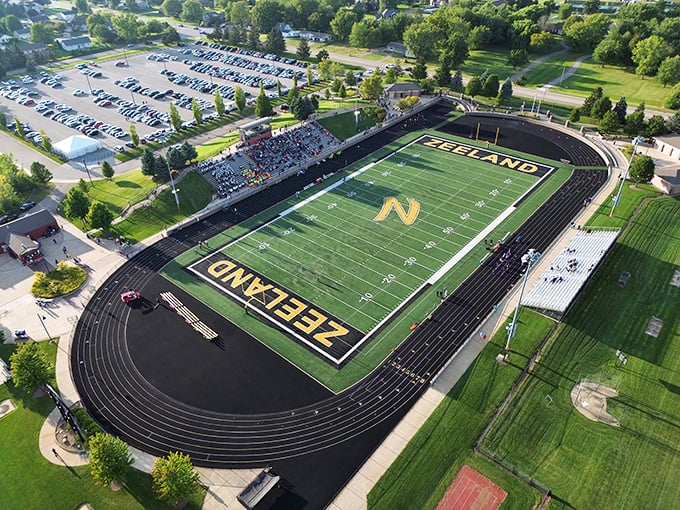 Friday night lights shine brightest at Zeeland Stadium, where community spirit and hometown pride fill the stands regardless of the scoreboard.