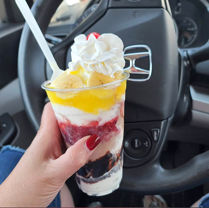Layer upon layer of sweet symphony – this banana split in a cup proves paradise doesn't need to be served on a plate.