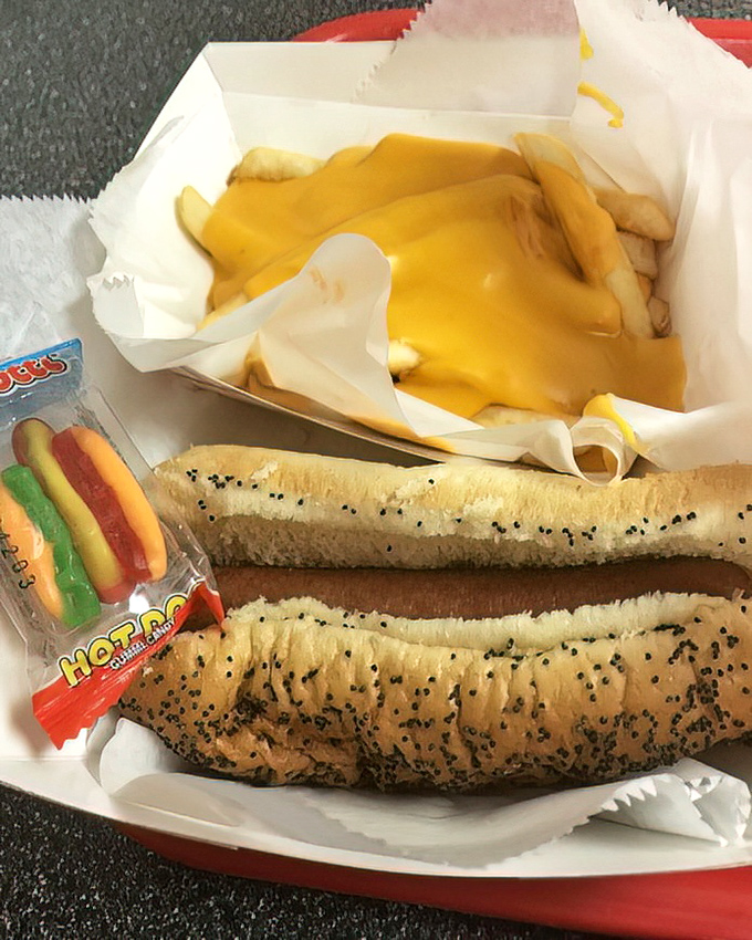 Two poppy seed buns awaiting their destiny, cheese fries standing by. This isn't just lunch&mdash;it's a commitment to joy that comes on a paper-lined basket.