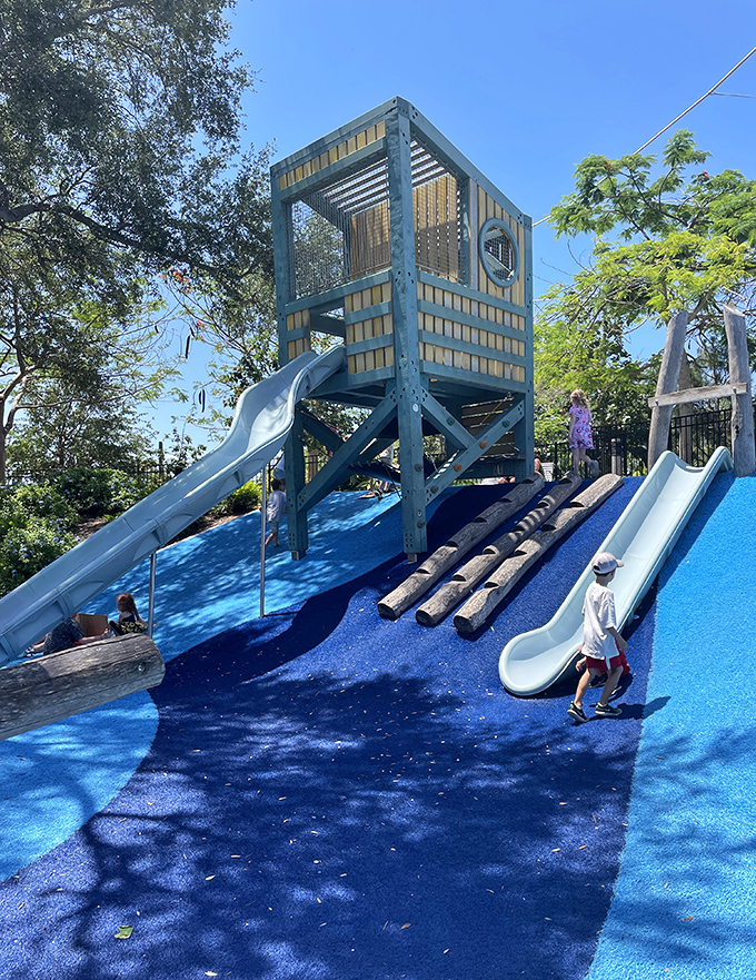 A multi-level play structure with slides that would make any kid (or kid-at-heart) giddy with anticipation for the ride down.