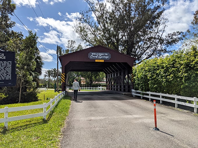 A solitary figure approaches the bridge, about to experience the brief but magical journey through Florida's only public covered bridge.