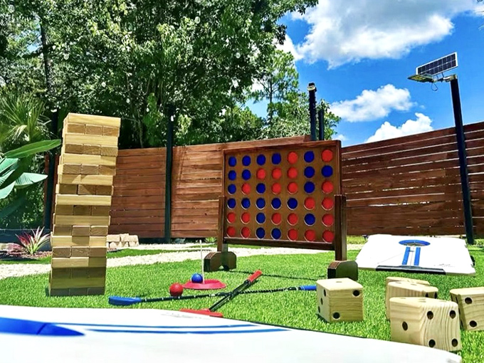 Giant yard games prove that competitive spirits grow proportionally with the size of the playing pieces.