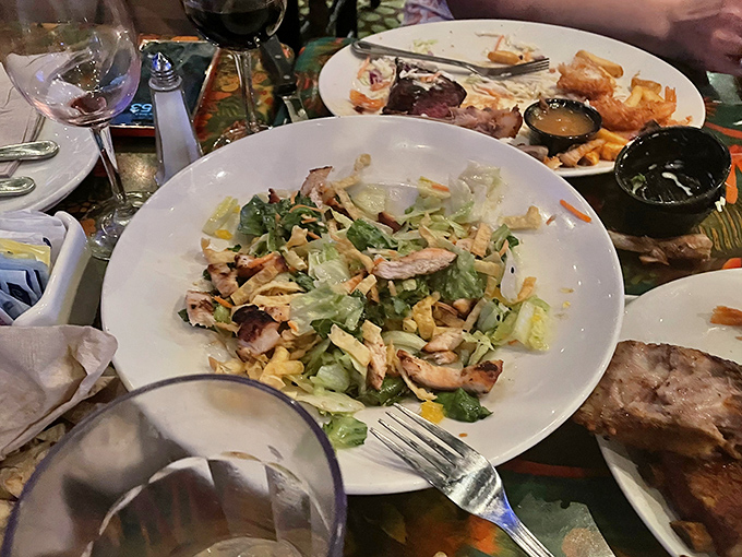 Even the salads get the jungle treatment, fresh ingredients arranged with enough care to make you momentarily forget you're eating vegetables.