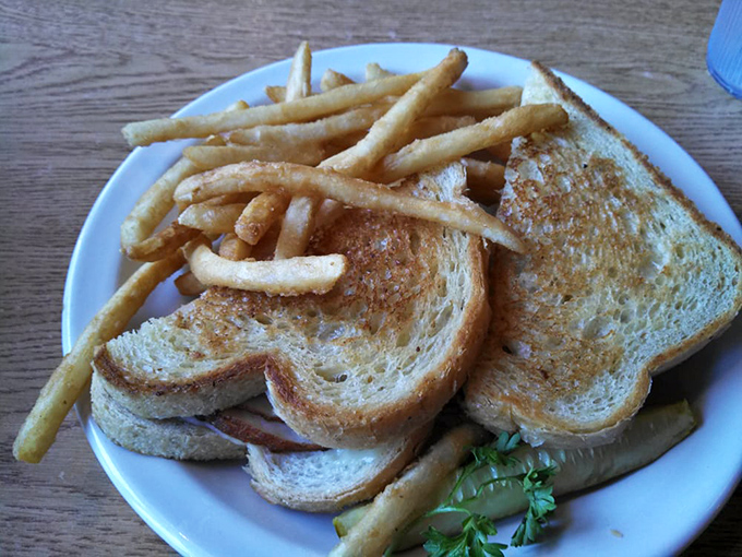 The classic grilled sandwich and fries combo &ndash; proof that simple pleasures are often the most satisfying, especially when the bread is perfectly golden-brown.