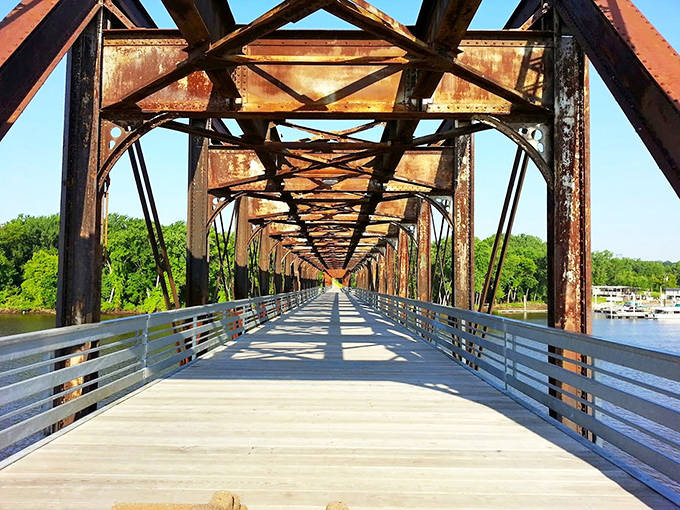 On sunny days, the cedar shingles glow amber against Minnesota's blue skies, creating a postcard-perfect scene.