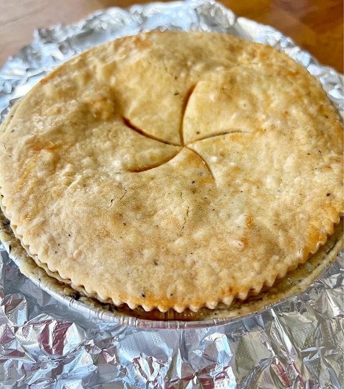 Golden chicken pot pie with a perfectly flaky crust that's basically a warm hug in pastry form.