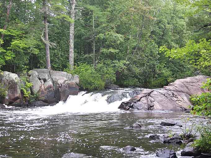 Dave's Falls features a natural water slide that sends water tumbling down smooth rock faces polished by centuries of flow.