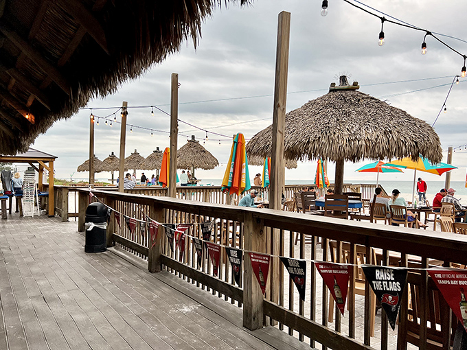 Breakfast with a view! Gulf Drive Cafe's blue umbrellas create perfect shade spots for enjoying morning pancakes with your toes in the sand.