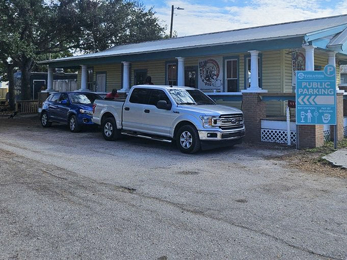The welcoming porch and cheerful exterior of Al's invite you to stay awhile. This house-turned-restaurant serves comfort food elevated by smoke and time.