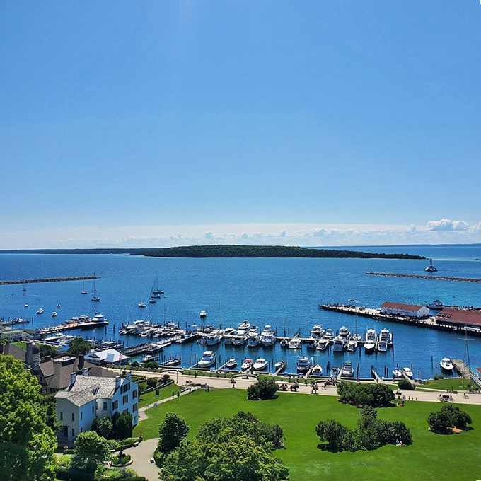 Azure waters surround Mackinac Island's harbor, where boats large and small deliver visitors to Michigan's most famous car-free destination.